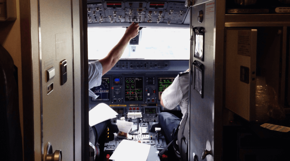 American Airlines passenger arrested for 'trying to break into the ...